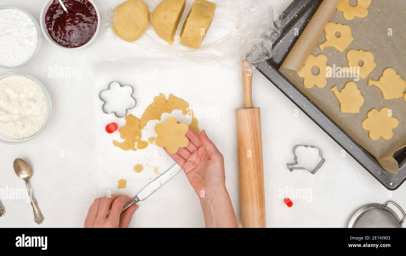 Flower shaped shortbread cookies filled with raspberry jam recipe ...