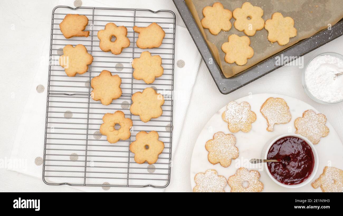 Flower shaped shortbread cookies filled with raspberry jam recipe ...