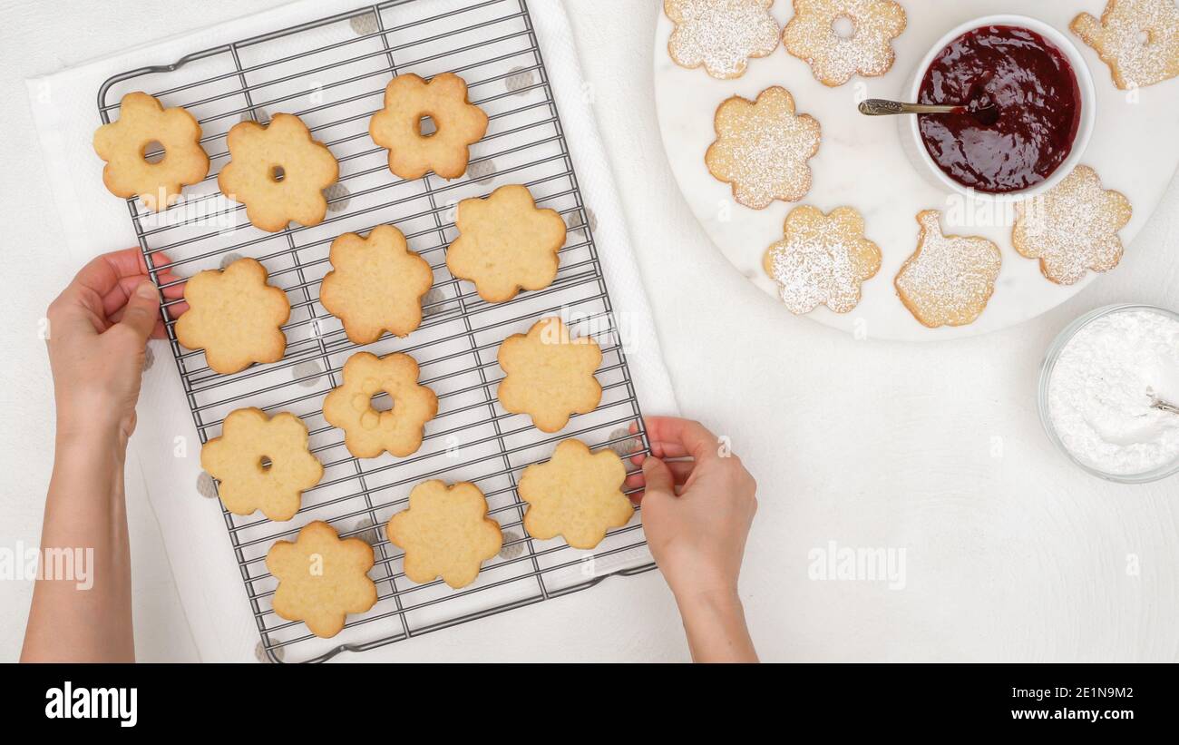 Flower shaped shortbread cookies filled with raspberry jam recipe ...