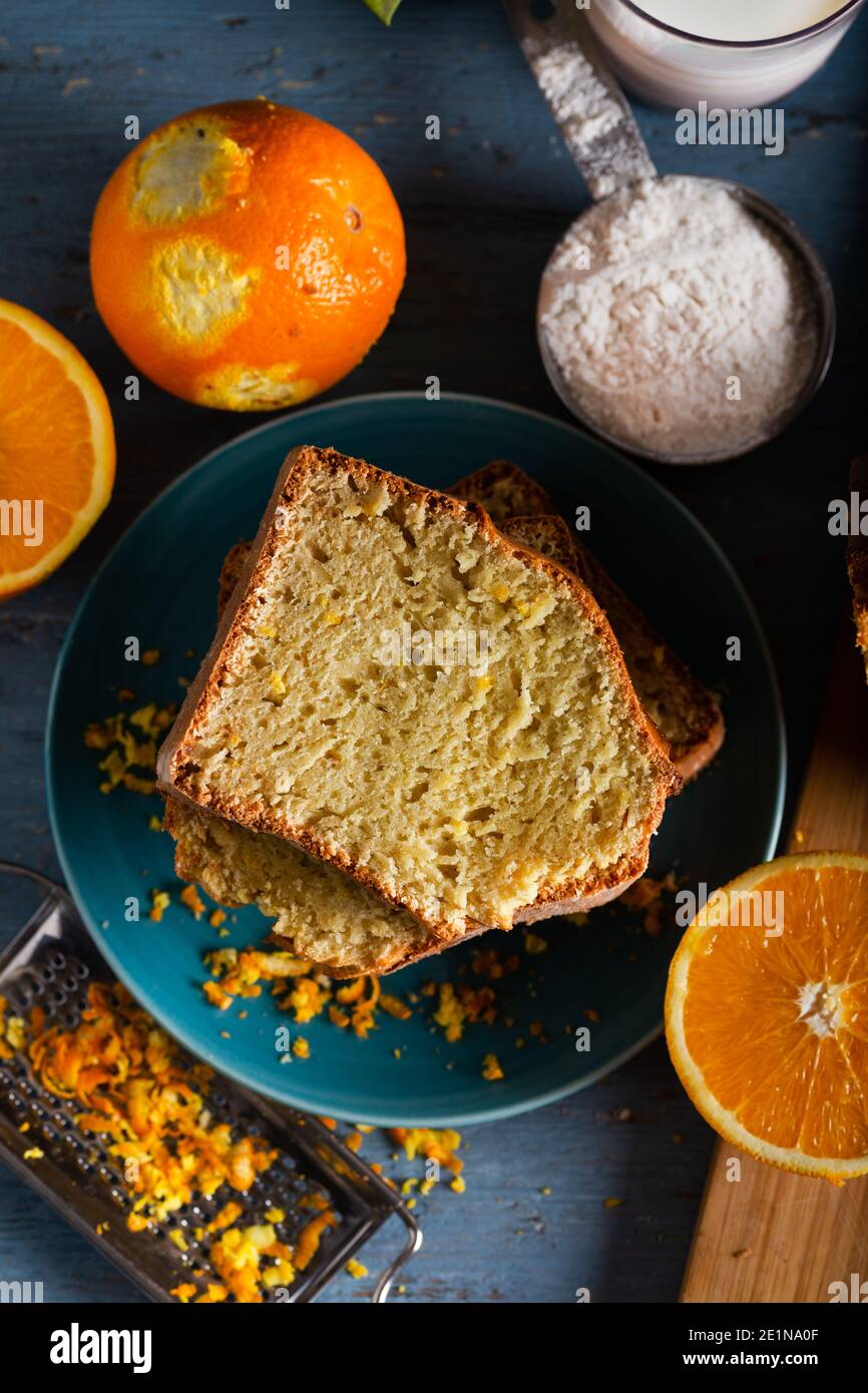 Homemade orange cake with fresh orange and milk Stock Photo - Alamy