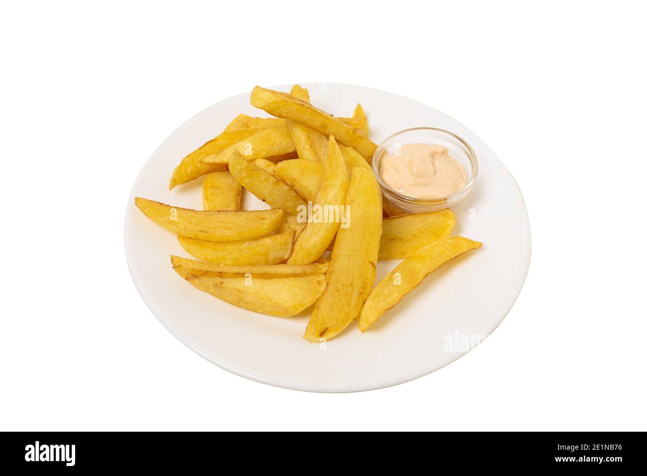 Plate of French fries with a bowl of pink mayonnaise. Isolated in a ...