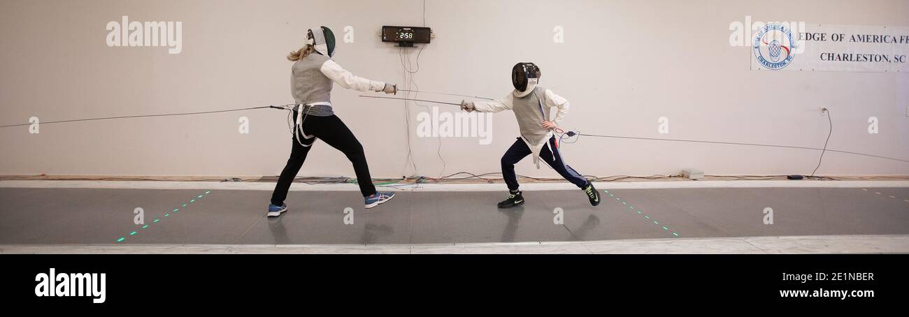 Fencing, sword fighting instruction in South Carolina Stock Photo - Alamy