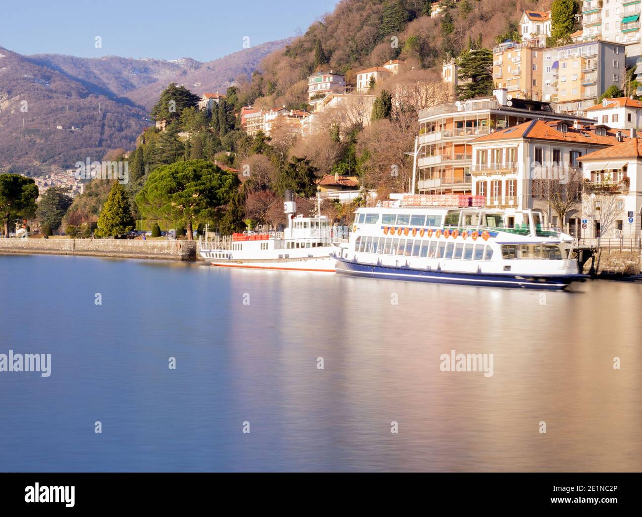 bright landscape of Como lakefront in a mild and sunny winter day.Como ...
