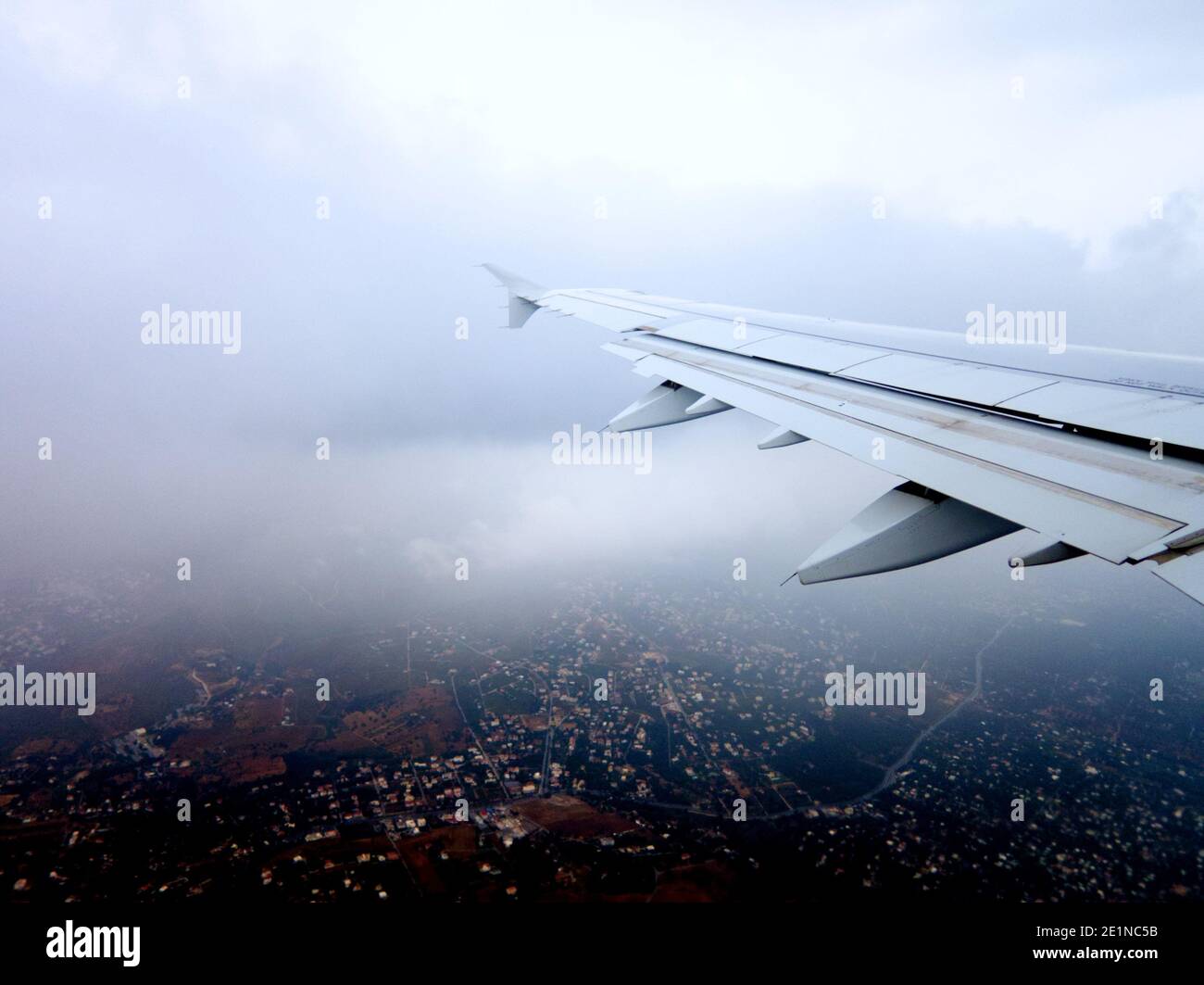 airplane wing over landscape Stock Photo - Alamy