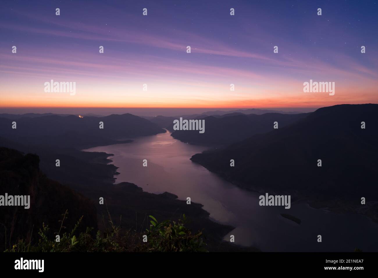 colorful sky of sunrise reflection on water in dam Stock Photo - Alamy