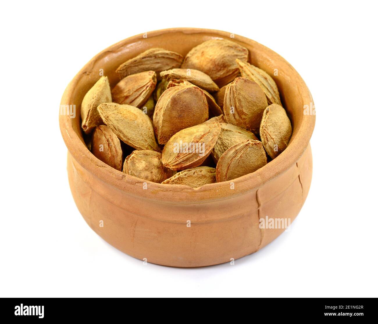 Dry apricot nut on white background Stock Photo - Alamy