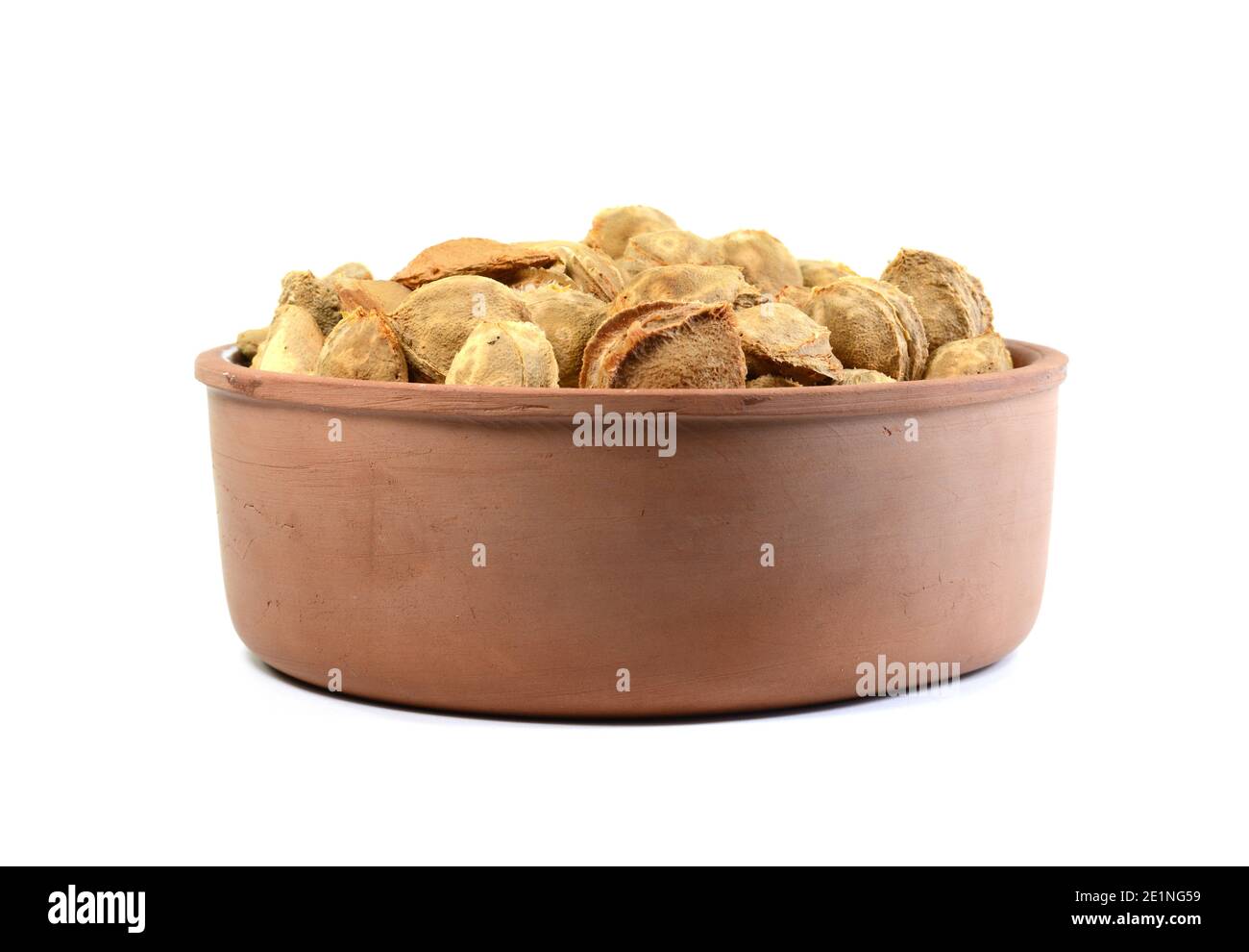 Dry apricot nut on white background Stock Photo - Alamy