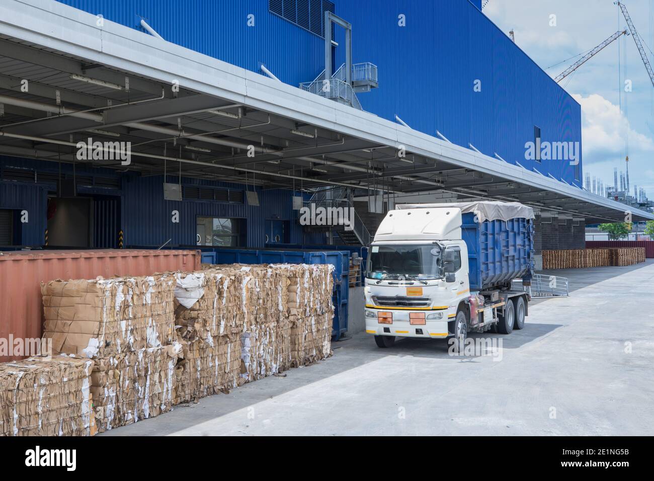Truck is carrying container parking in front warehouse Stock Photo - Alamy