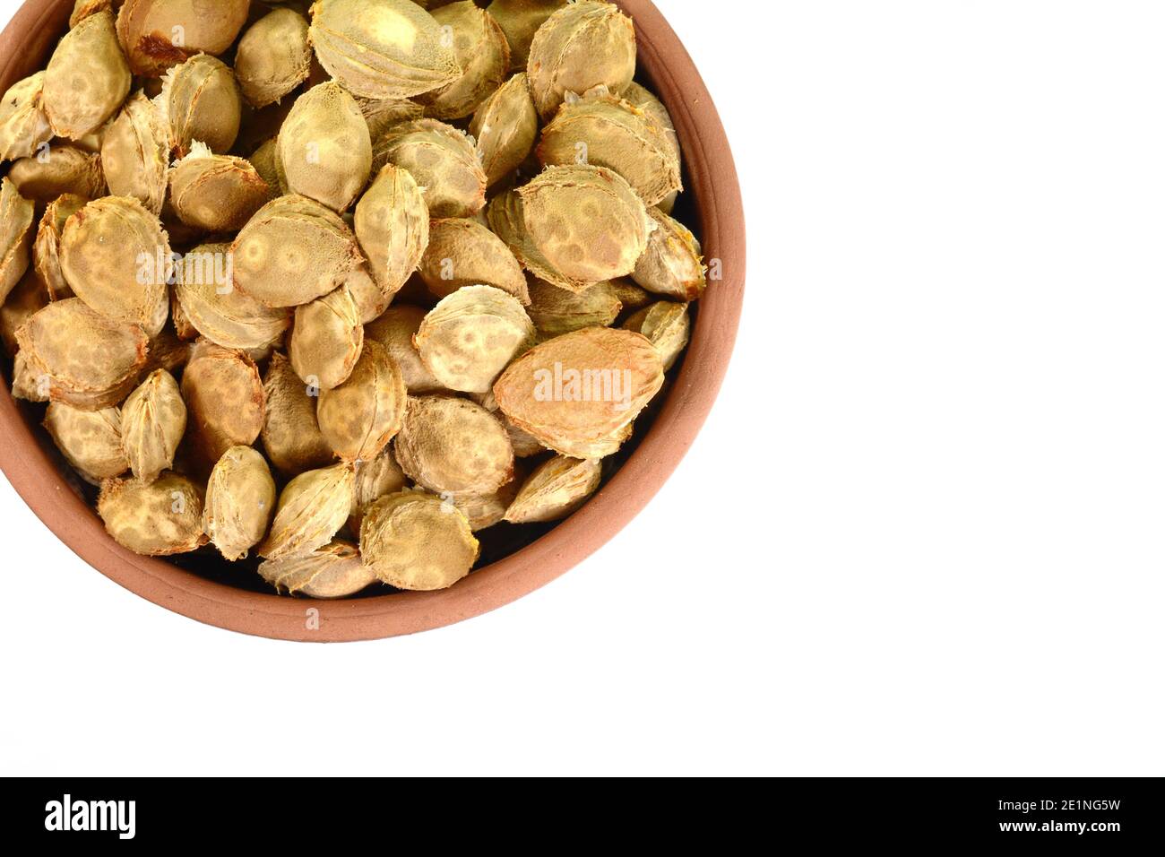 Dry apricot nut on white background Stock Photo - Alamy