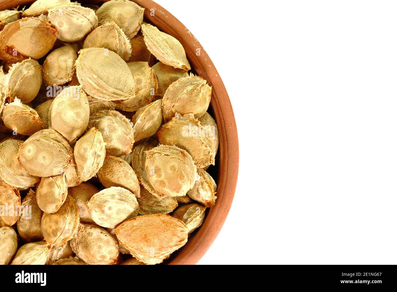 Dry apricot nut on white background Stock Photo - Alamy