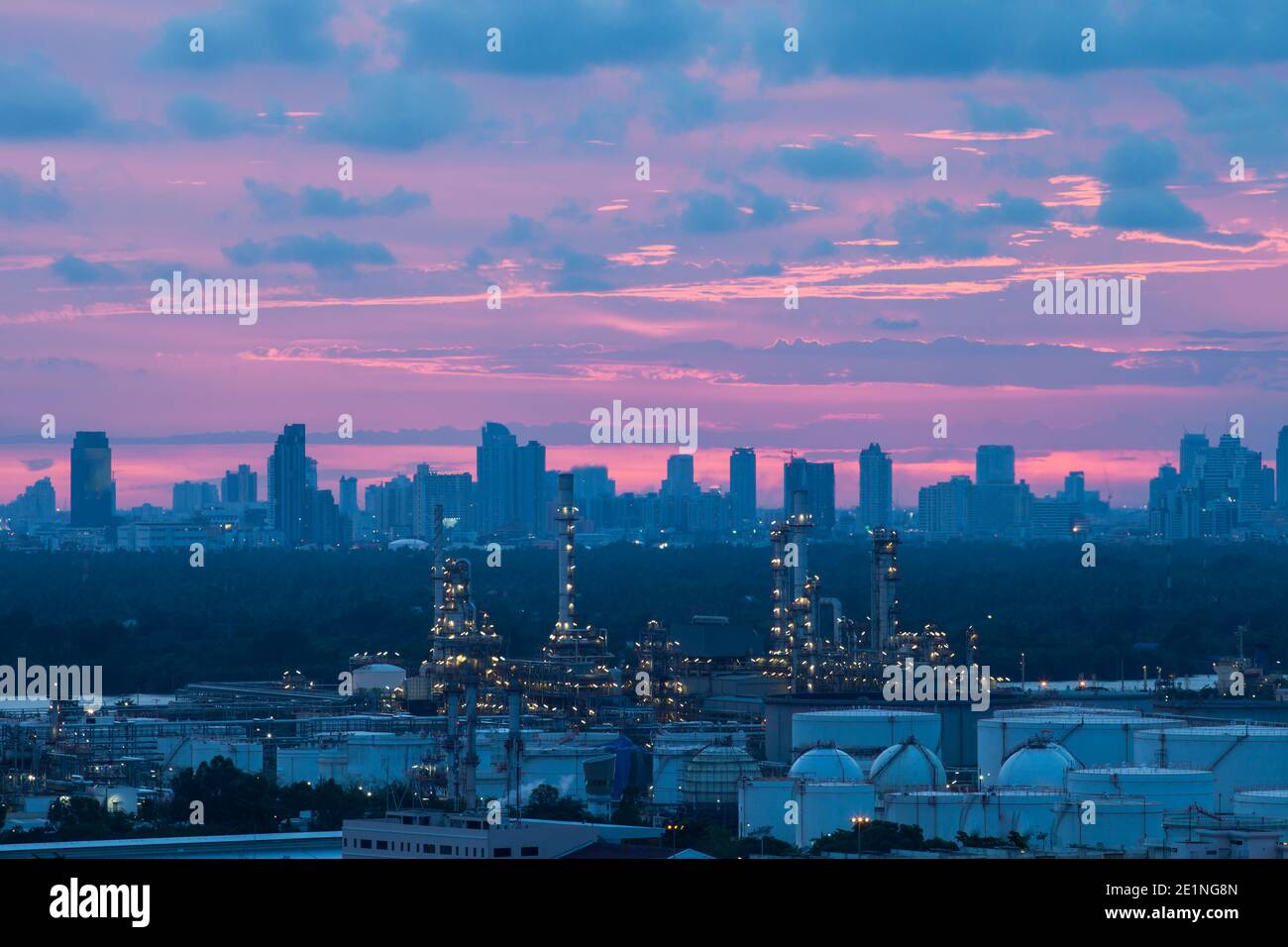 Oil refinery industry under colorful sky at sunset time Stock Photo - Alamy