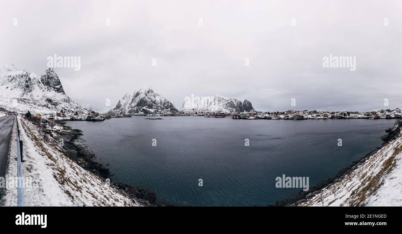 Harbor rorbuer snowy mountains hi-res stock photography and images - Alamy