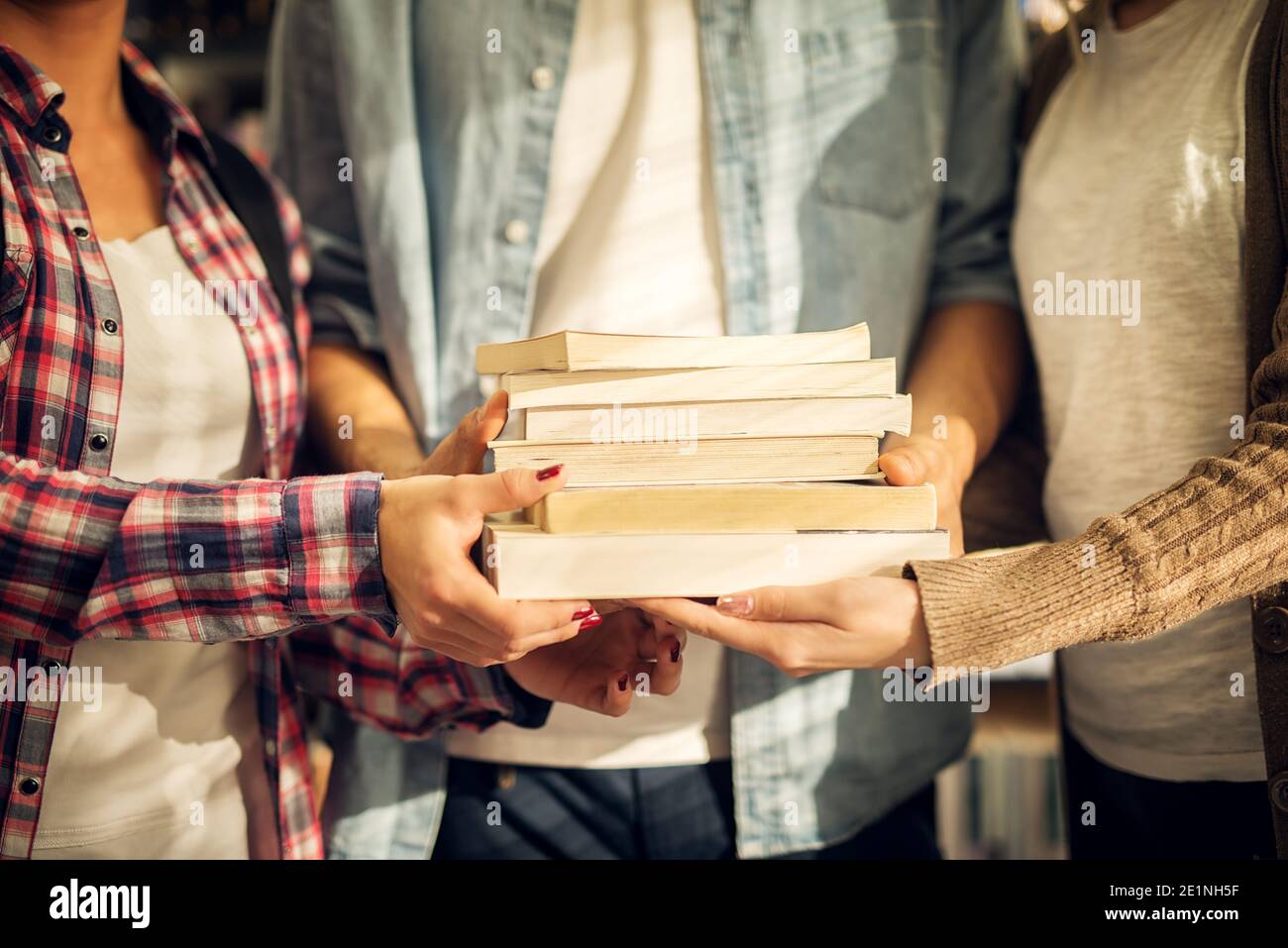Woman carrying books business hi-res stock photography and images - Alamy