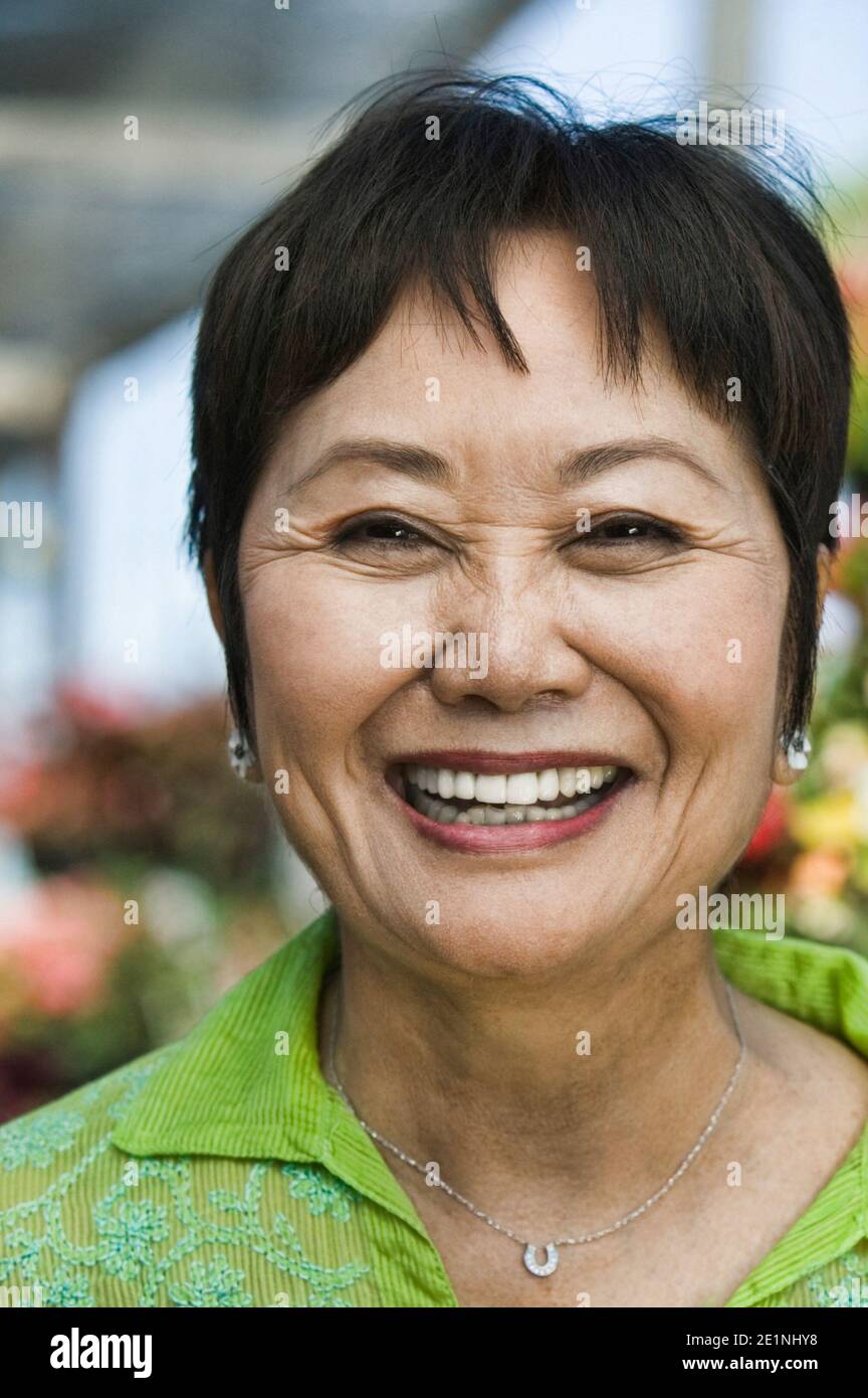 Portrait of senior chinese woman smiling Stock Photo - Alamy