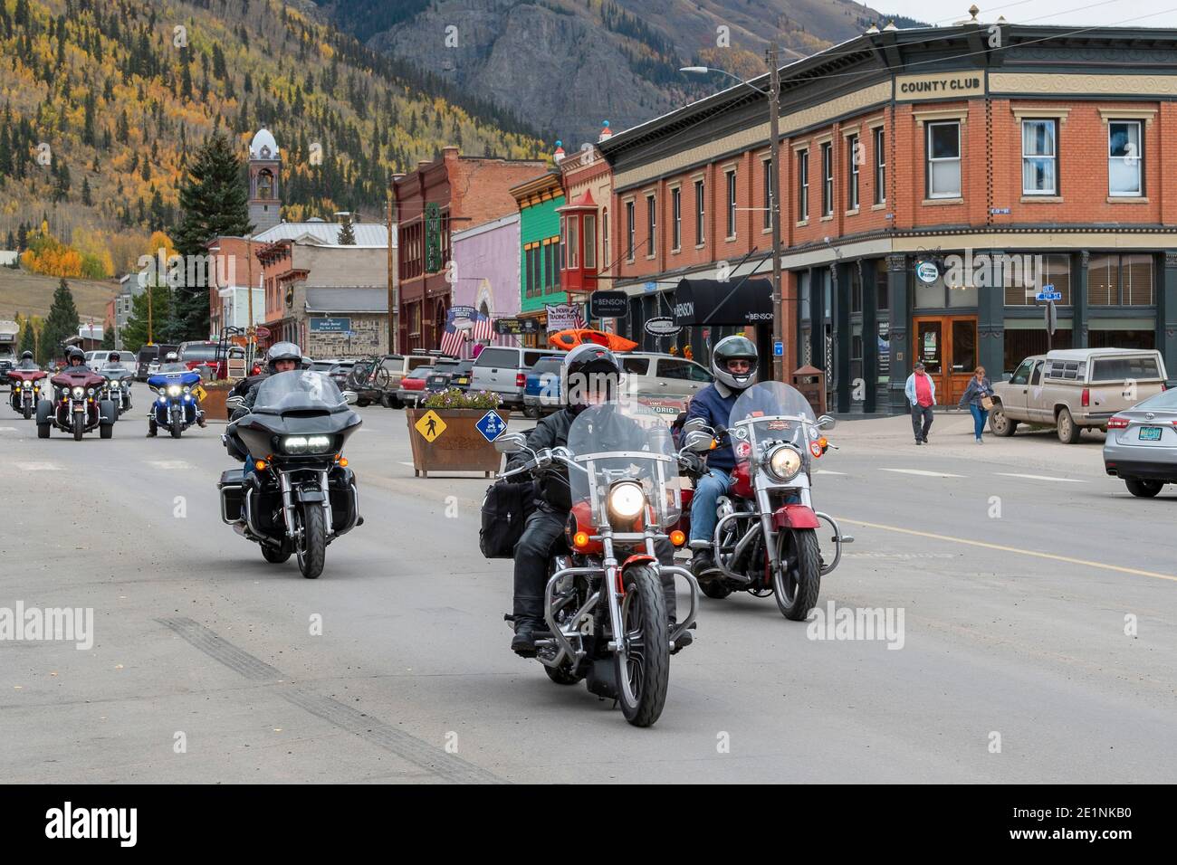Motocyclists driving along Greene Street, Silverton, Colorado, USA ...