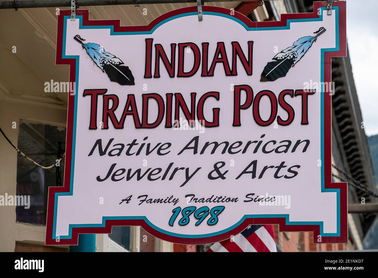 Suspended street sign for the Indian Trading Post store, Greene Street ...