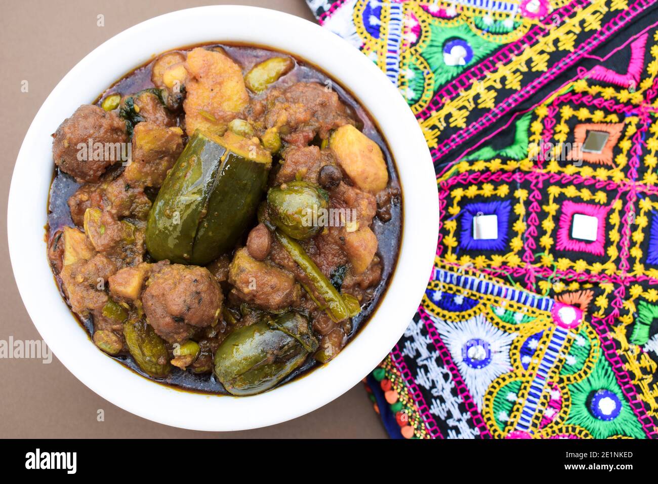 Undhyu or Oondhyu a gujarati delicary dish served in handi bowl with ...