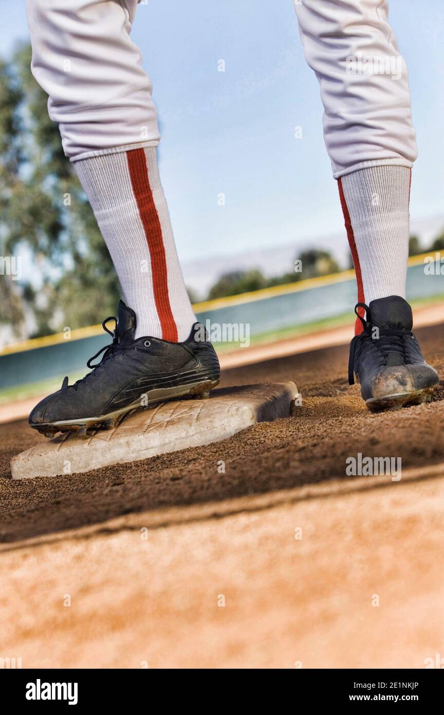 Baseball boy standing on base hi-res stock photography and images - Alamy