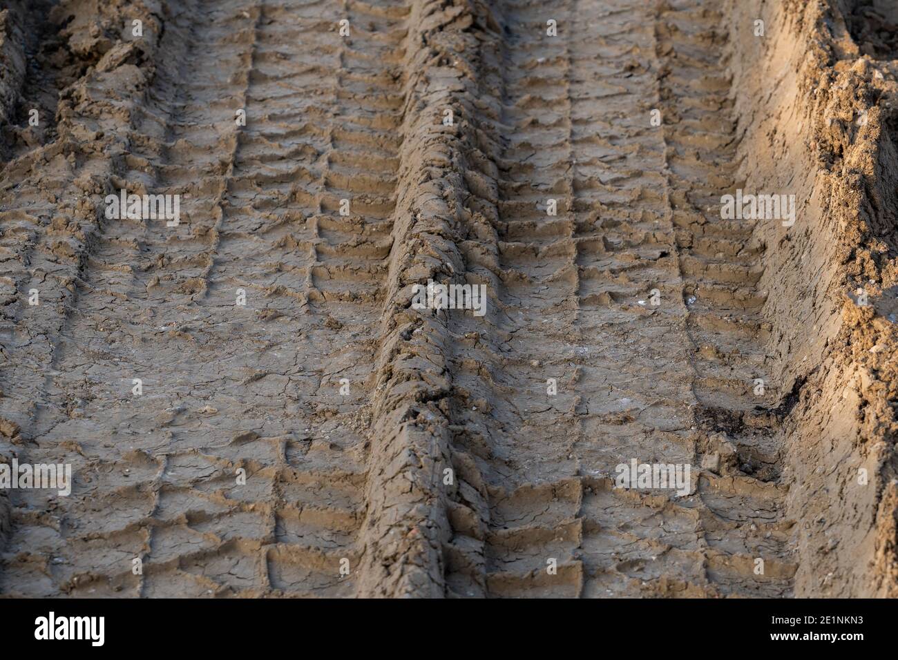 Big car wheel trace on road, puddle and mud. Ground Stock Photo - Alamy