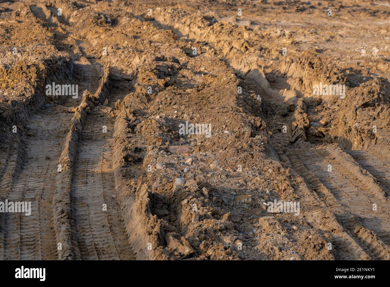 Big car wheel trace on road, puddle and mud. Ground Stock Photo - Alamy
