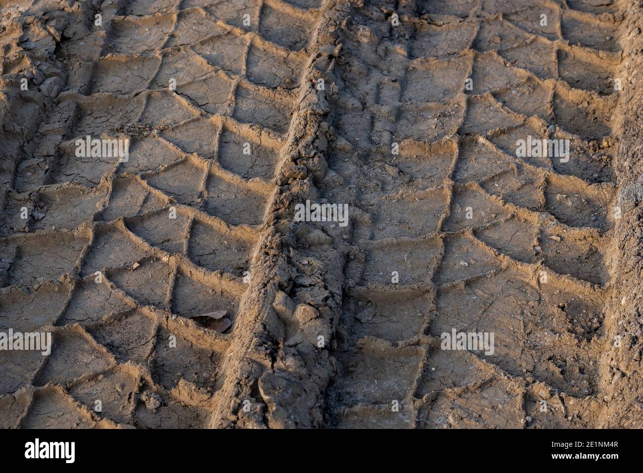 Big car wheel trace on road, puddle and mud. Ground Stock Photo - Alamy