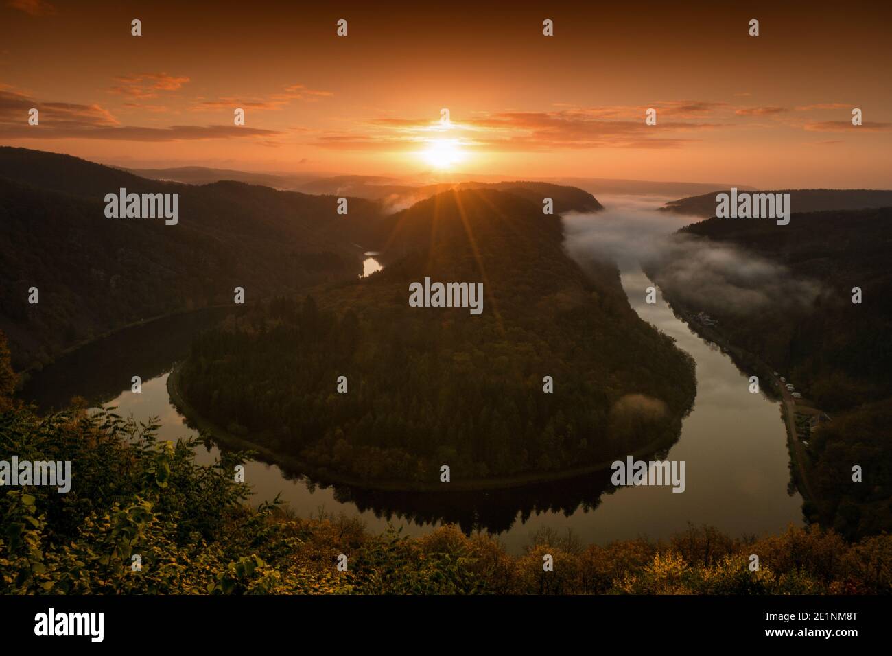 Saar loop in the fog at sunrise, Germany Stock Photo - Alamy