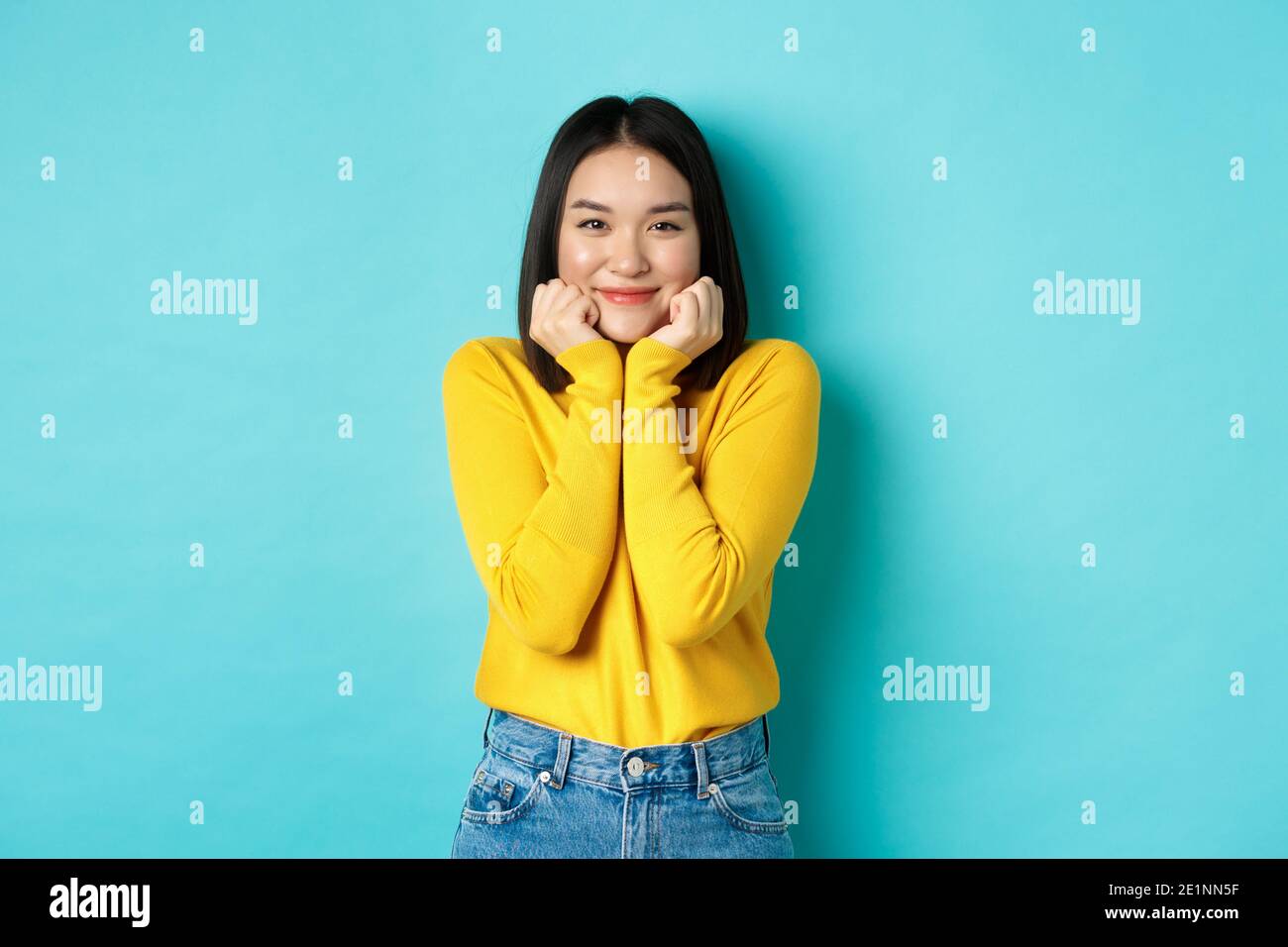 Beauty and fashion concept. Beautiful asian woman blushing and smiling ...