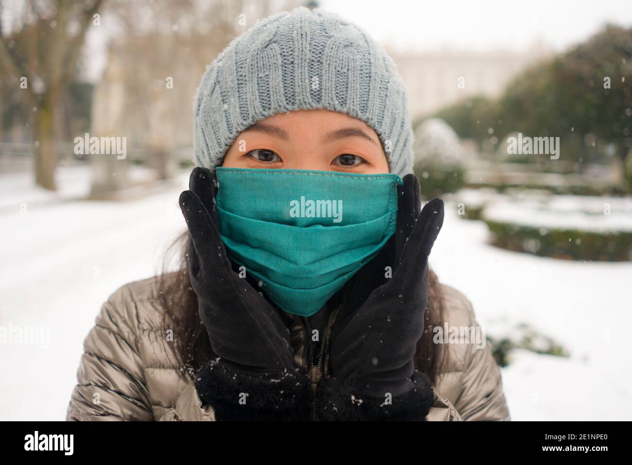 snowfall in covid19 time - young happy and attractive Asian Japanese ...