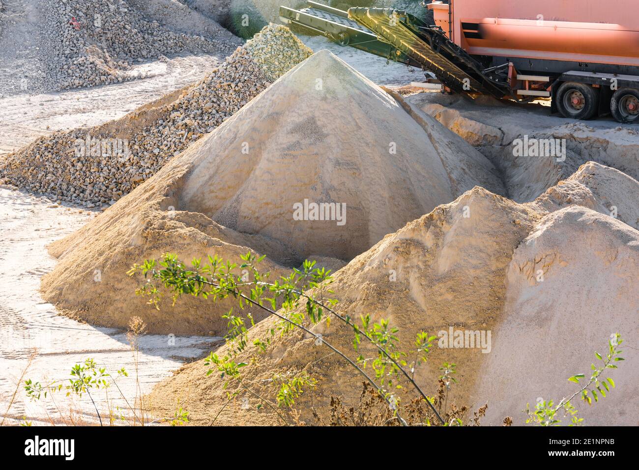 Pile of gravel and sand piled up in a quarry for sale and use in ...