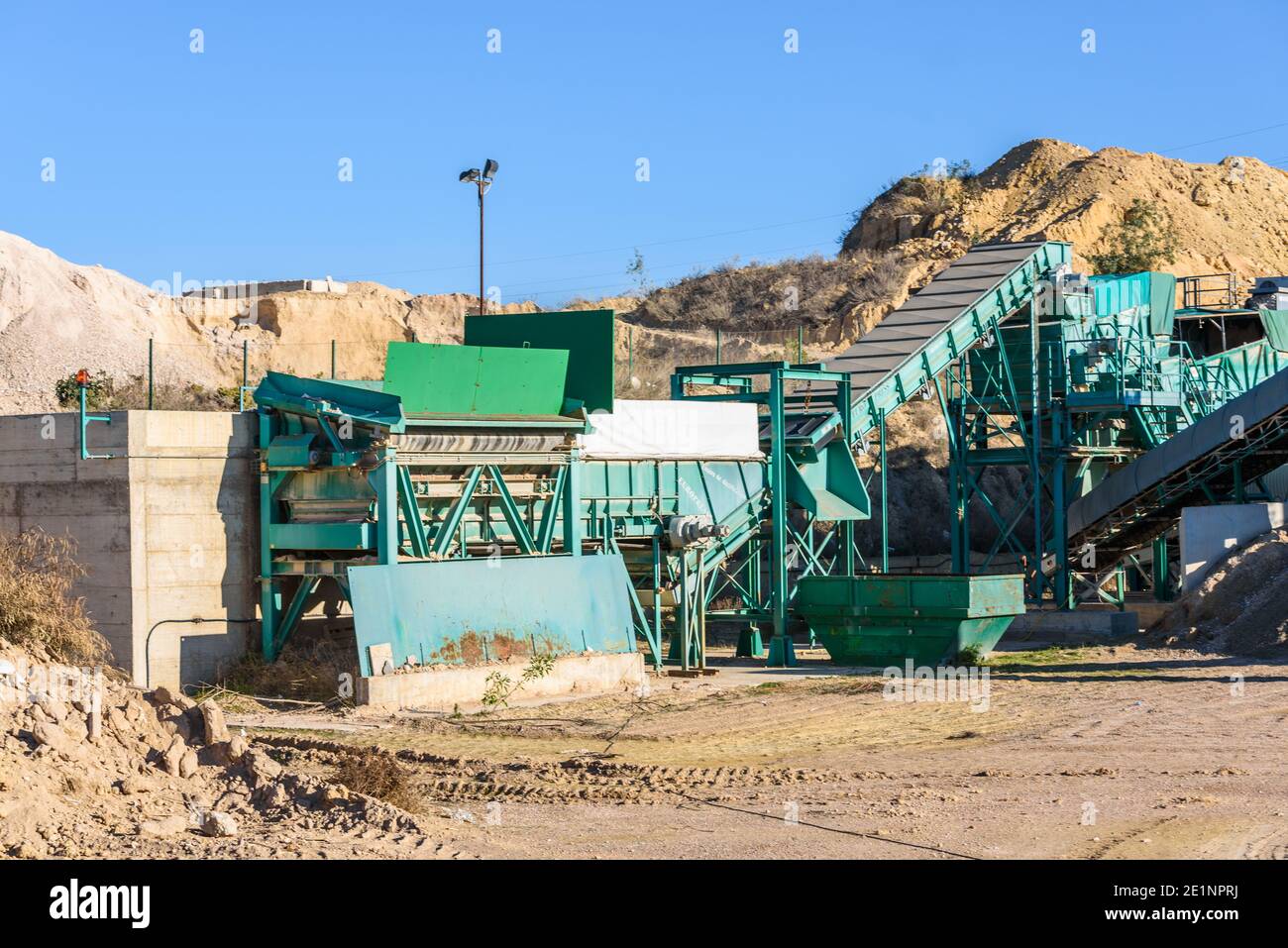 Machinery in a rock quarry to crush and sand the stone Stock Photo - Alamy
