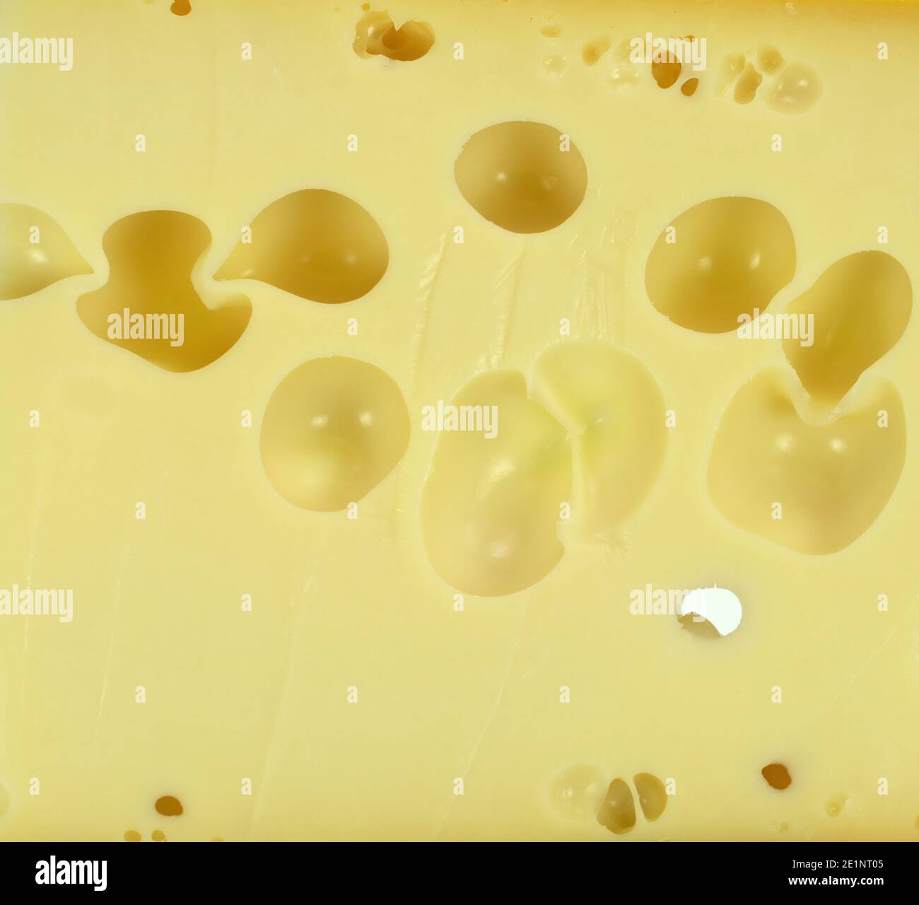Cheese texture background. Cheese with holes Stock Photo - Alamy