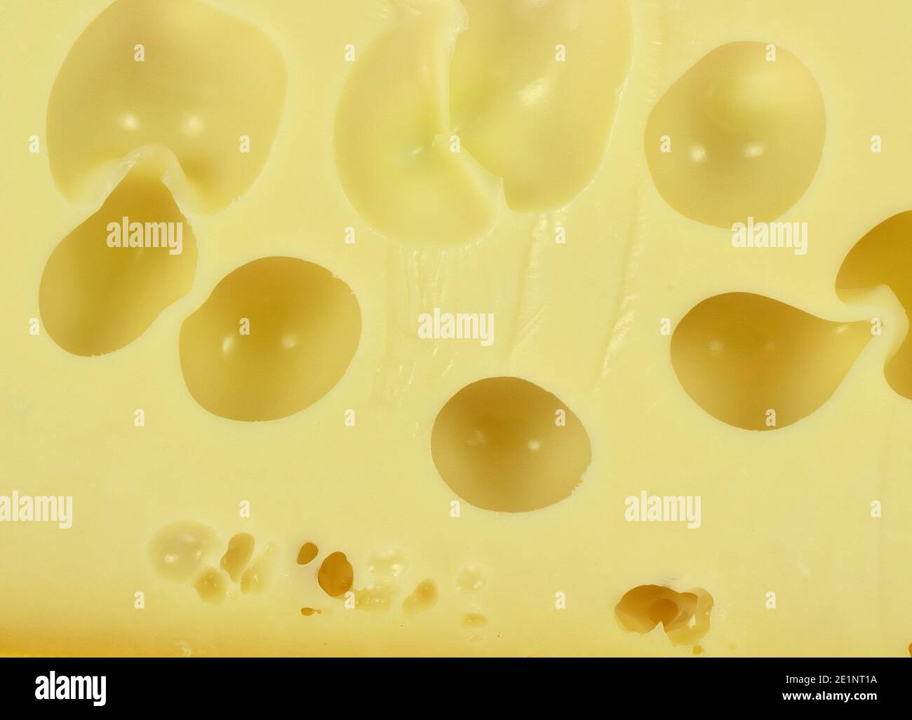 Cheese texture background. Cheese with holes Stock Photo - Alamy