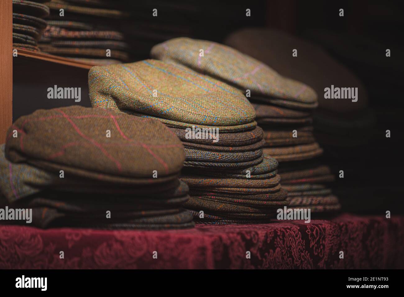 Traditional Scottish mens country tweed caps on display for sale Stock ...