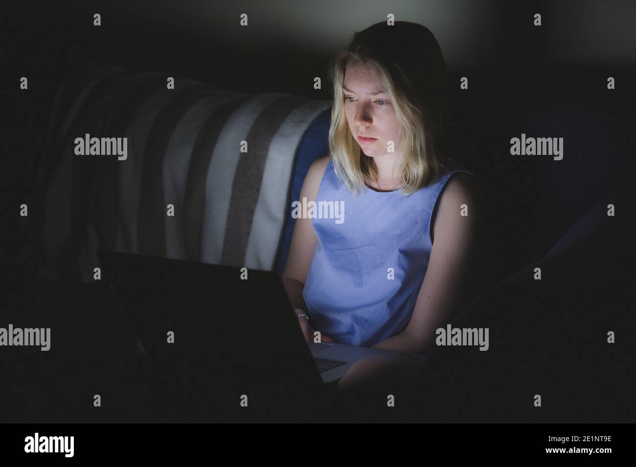 A Young Woman Is Fatigued From Staying Up All Night Staring At The