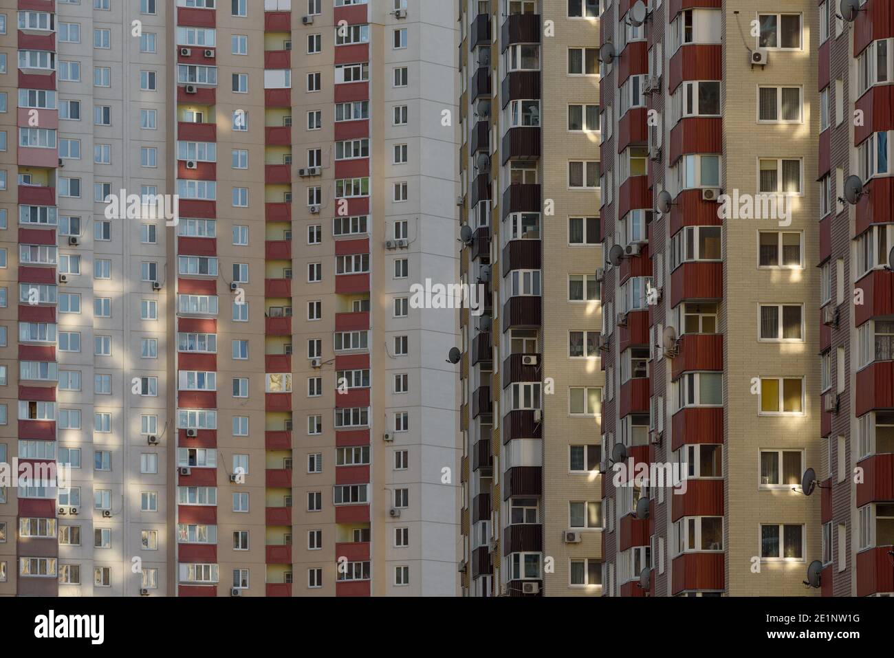 Abstract architectural background with apartment buildings in a growing ...