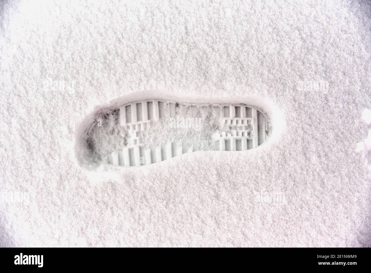 Relief clear footprint on the white snow Stock Photo - Alamy