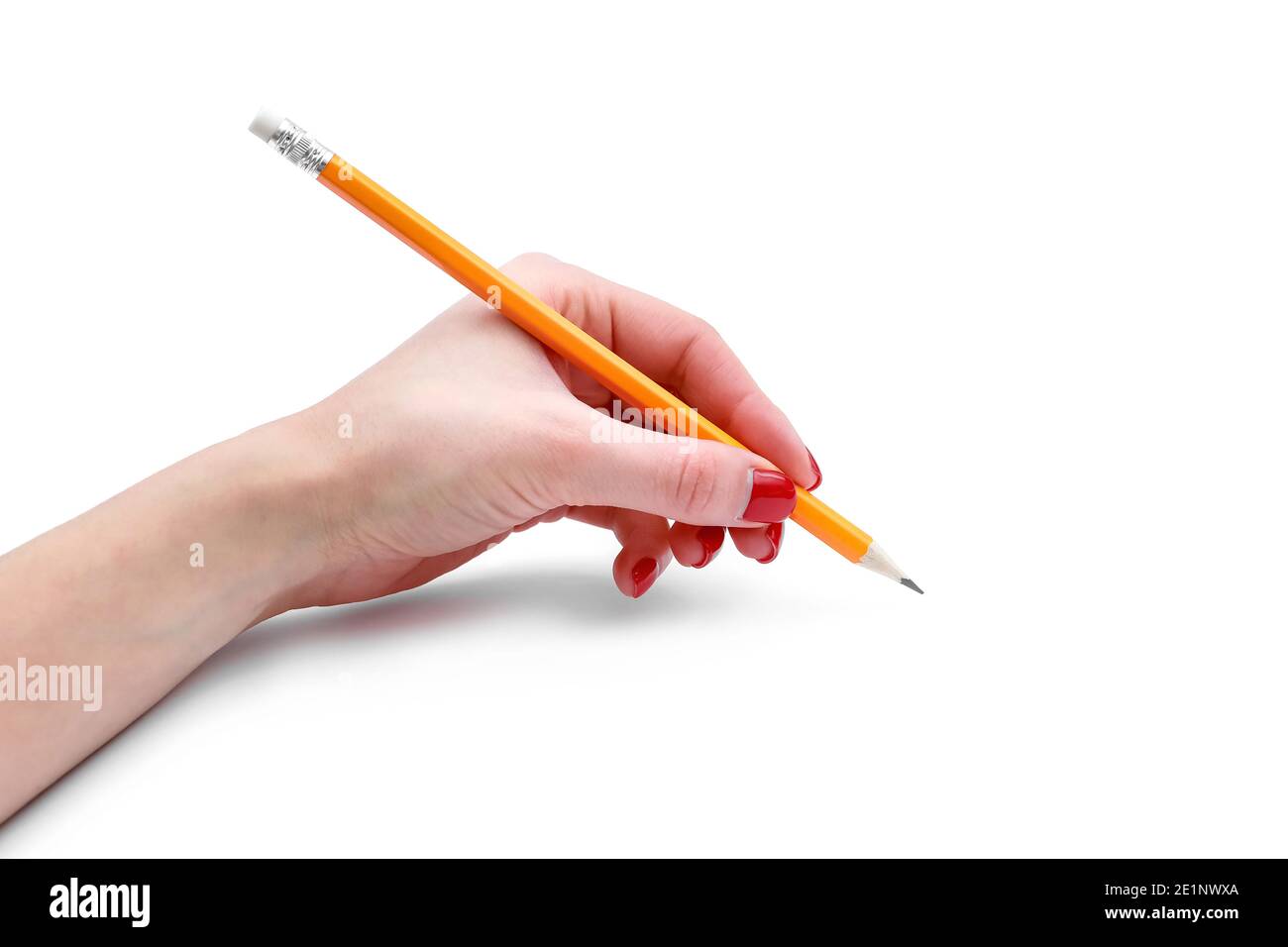 Female hand holding pencil isolated on white background, close-up ...