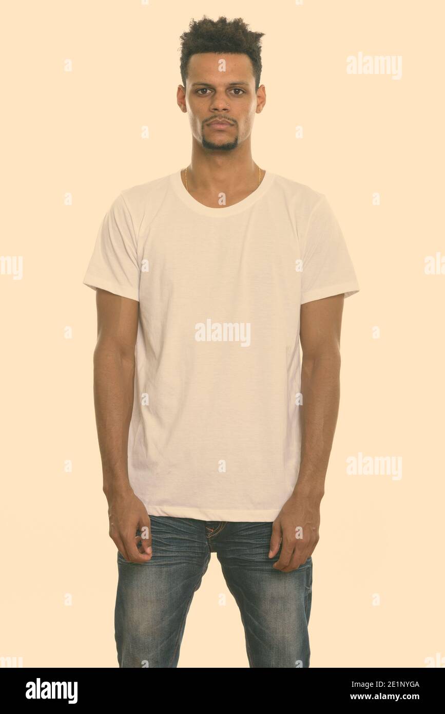 Man black hair standing hi-res stock photography and images - Alamy