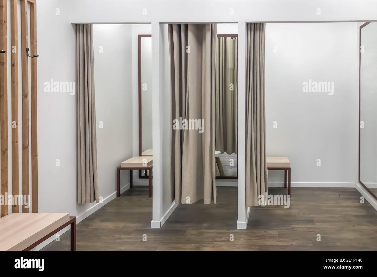 A row of dressing booths for trying on clothes Stock Photo - Alamy