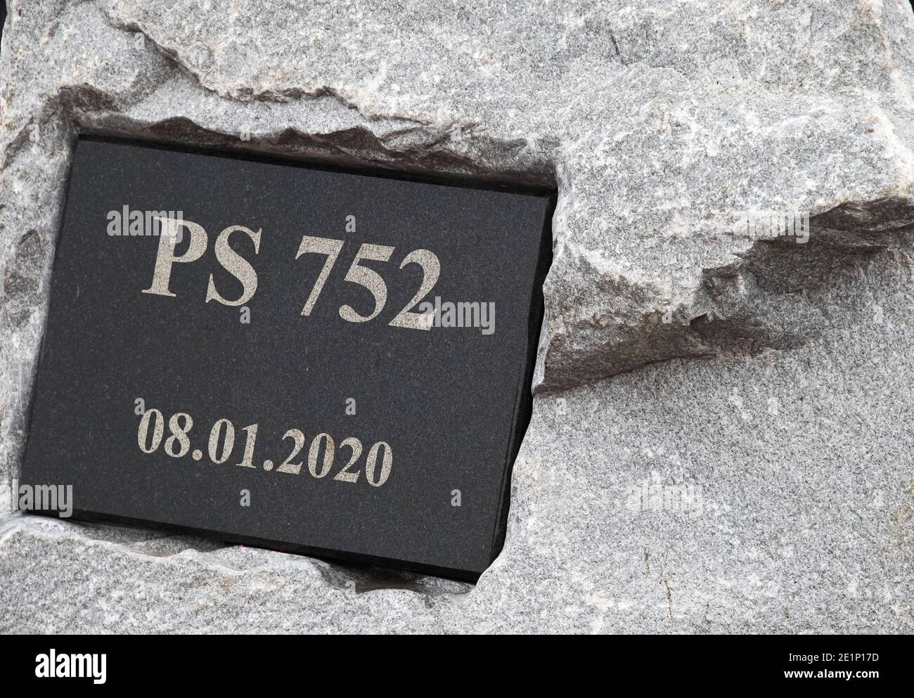 A memorial stone seen during the ceremony at the site of the future ...