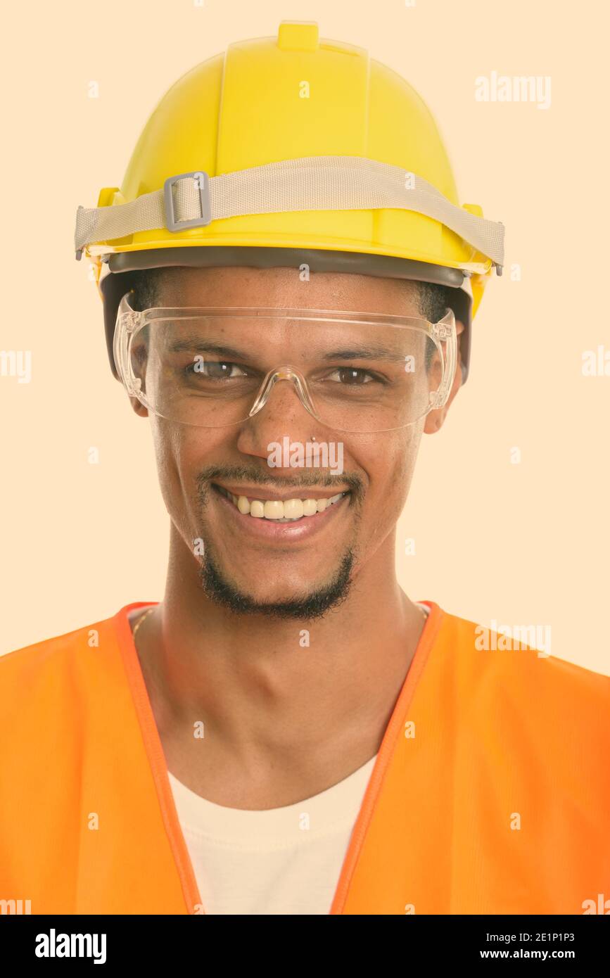 Face of happy African man construction worker smiling while wearing ...