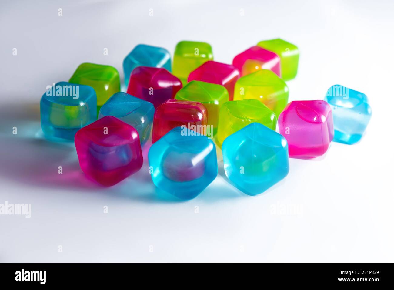 plastic cubes filled with liquid for freezing and cooling water. Icy ...