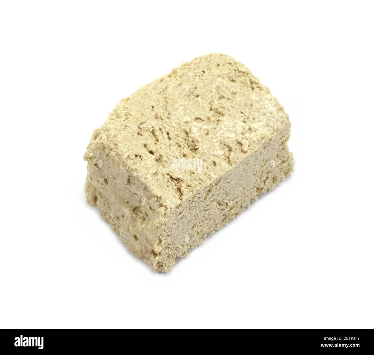 Sunflower halva isolated on white background Stock Photo - Alamy