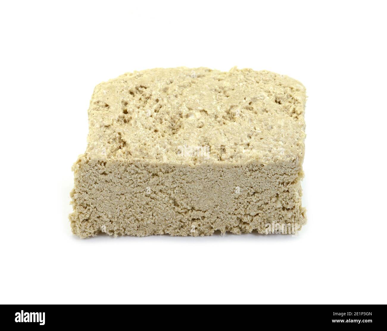 Sunflower halva isolated on white background Stock Photo - Alamy