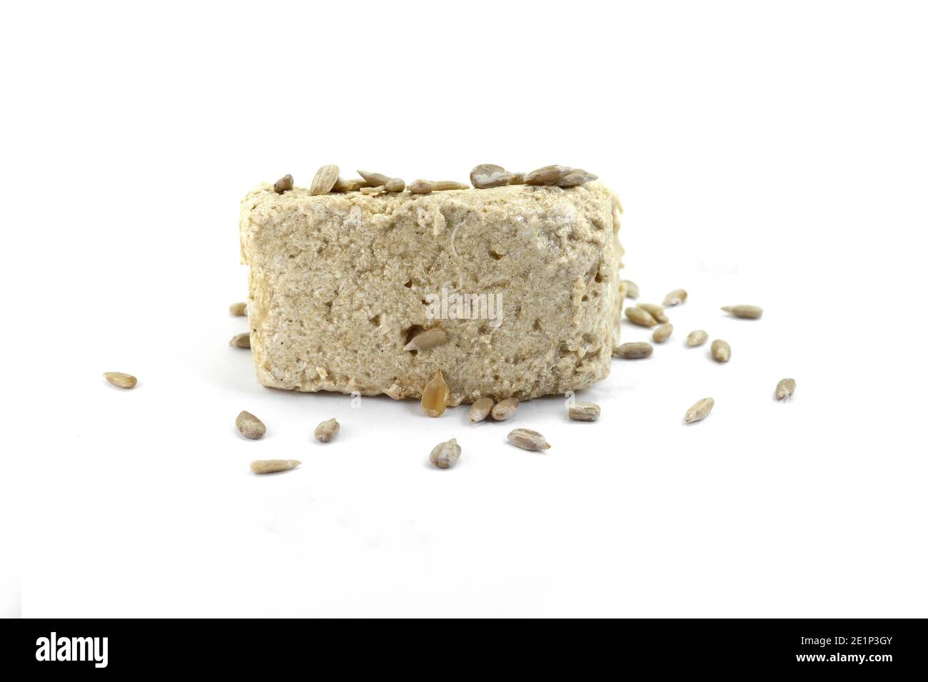 Sunflower halva isolated on white background Stock Photo - Alamy