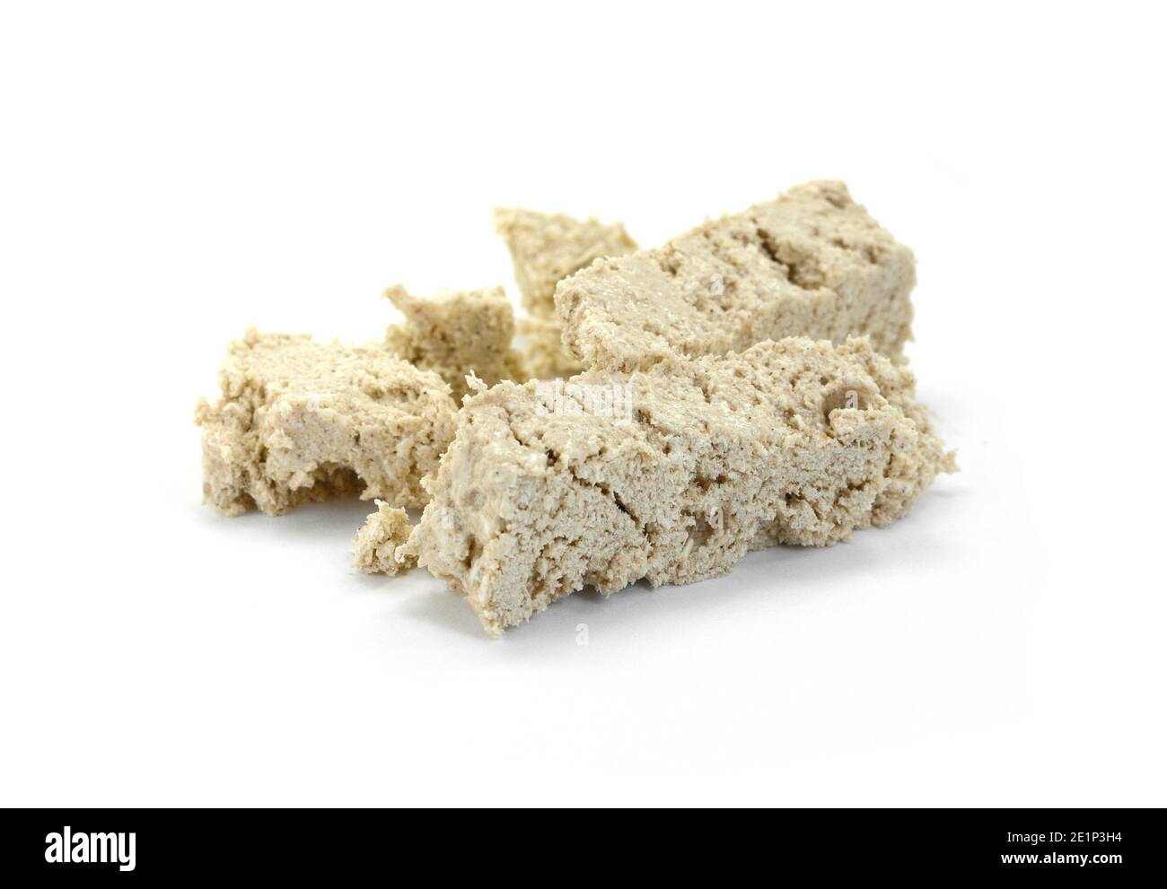 Sunflower halva isolated on white background Stock Photo - Alamy