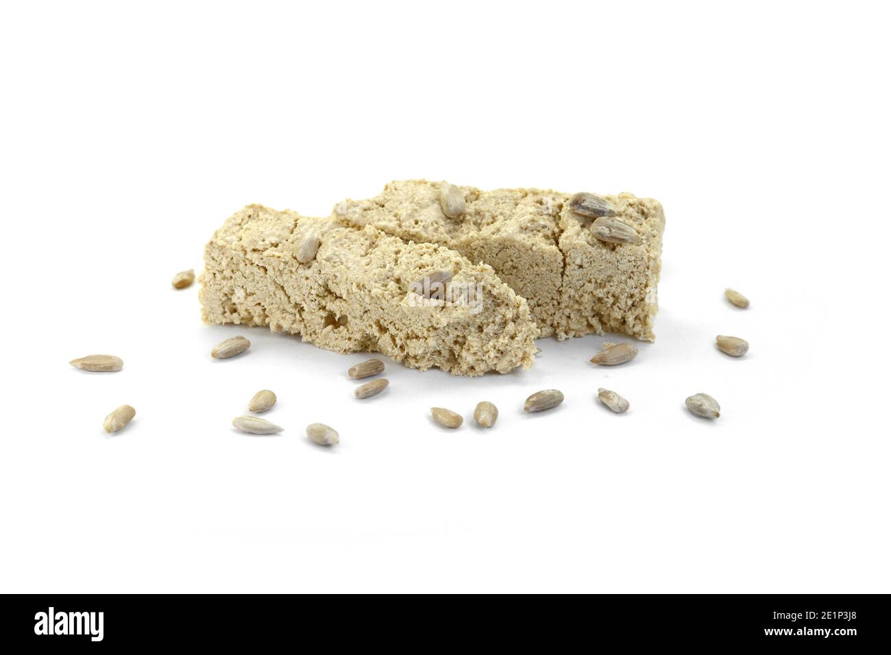 Sunflower halva isolated on white background Stock Photo - Alamy