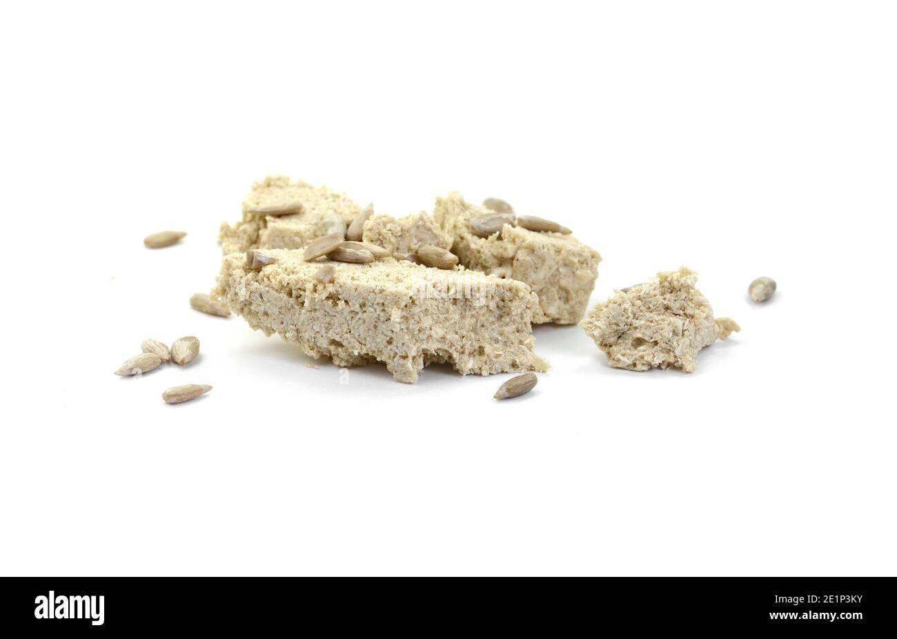 Sunflower halva isolated on white background Stock Photo - Alamy