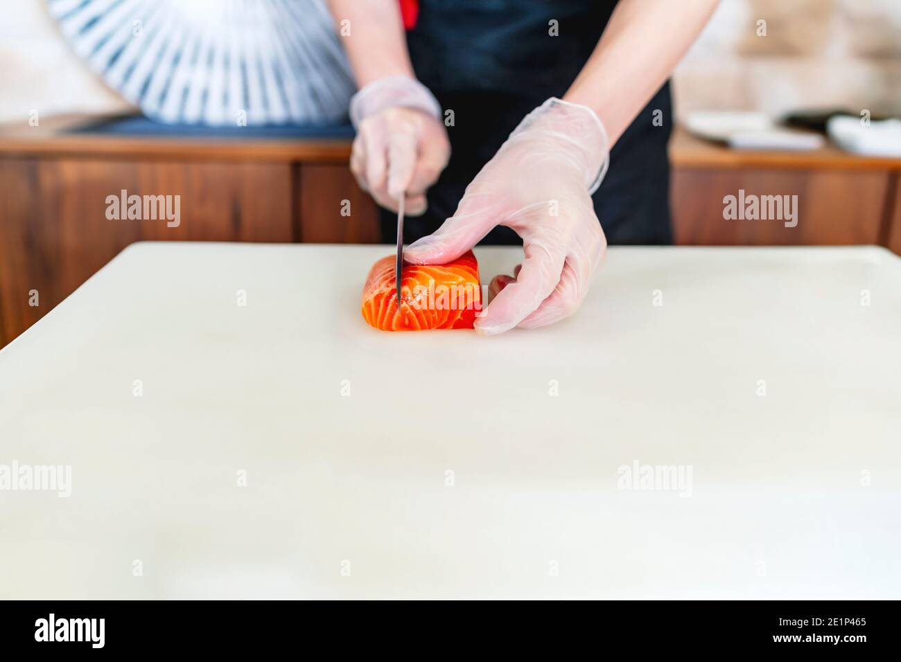 Male chef hands cutting cooked hi-res stock photography and images - Alamy