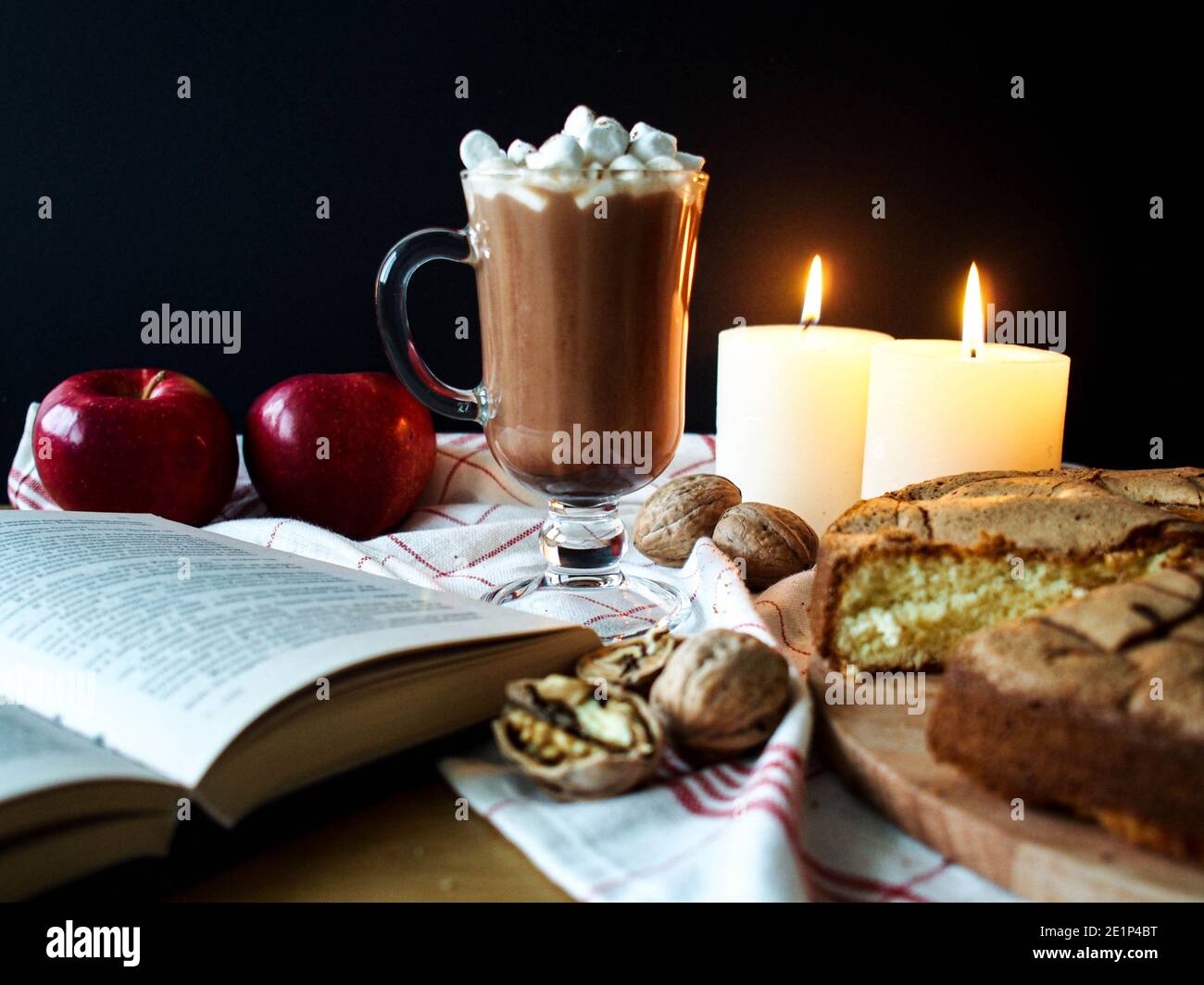 cozy evening by candlelight with cocoa and cake Stock Photo - Alamy